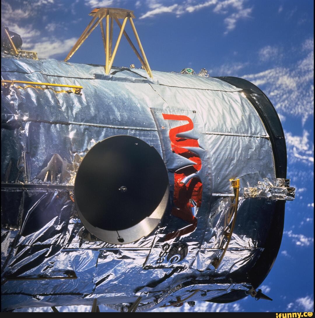 The old style NASA logo located on the Hubble Space Telescope consists ...