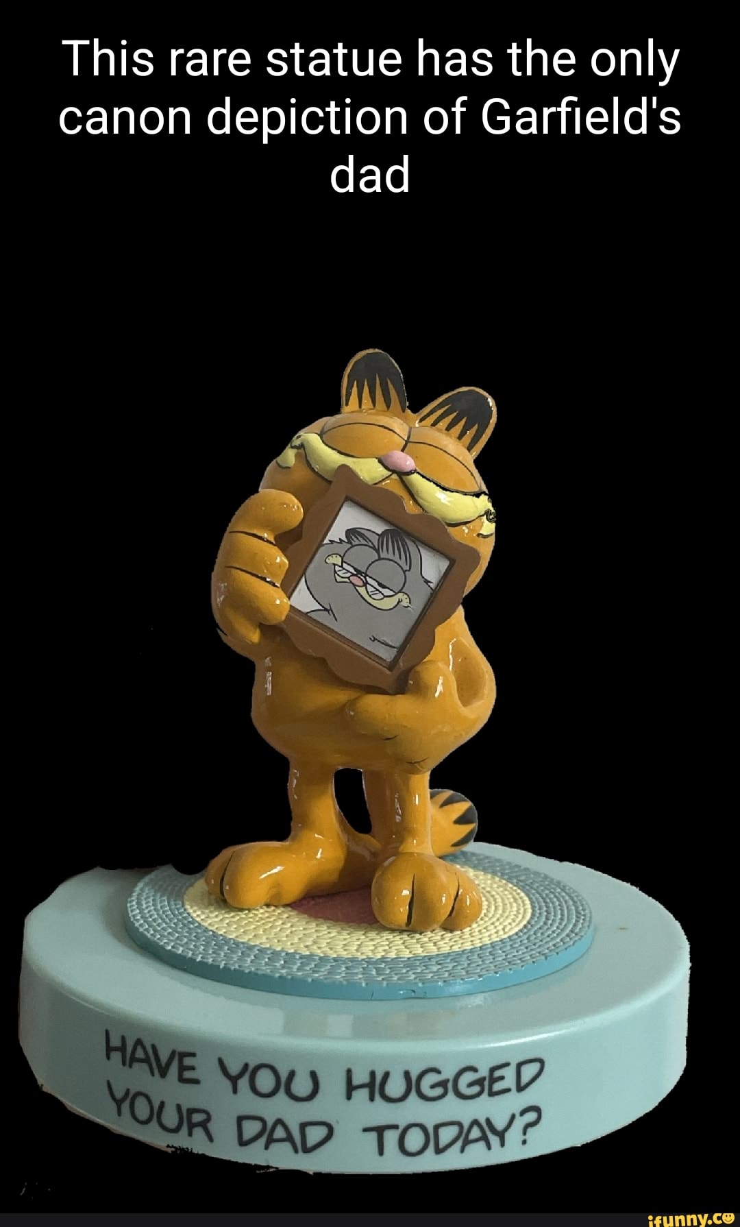 This rare statue has the only canon depiction of Garfield's dad HUGG ...